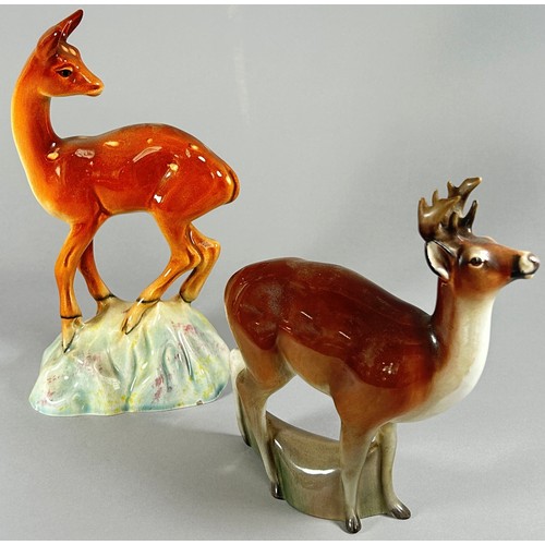A collection of ceramic figures comprising a Royal Doulton Stag, a ...