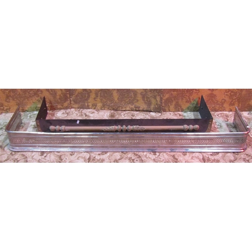 Two fire fenders of varying design, the larger example with pierced ...