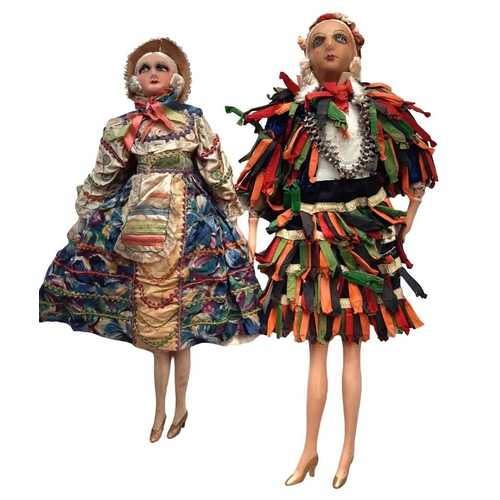 Two 1920's boudoir dolls with soft body and ceramic lower limbs, the larger having a composition he