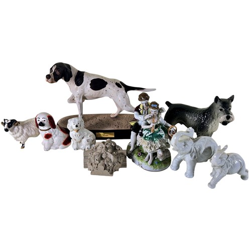 A Beswick matt glazed figure of a pointer, a Beswick ram, further ...