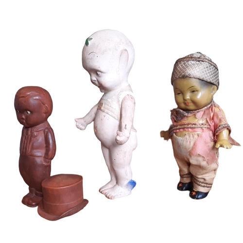 Three early 20th century kewpie type dolls comprising a Fumsup bisque ...