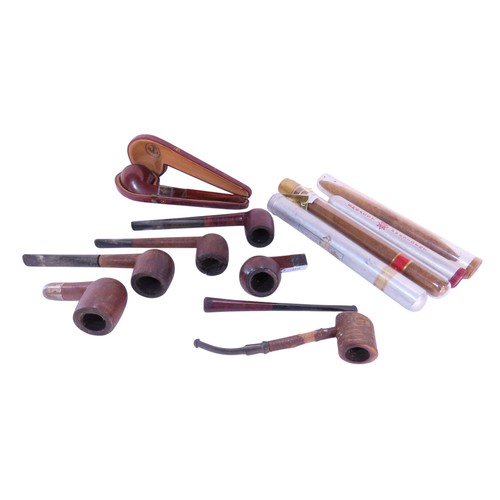 A handmade Bering cigar sealed in a glass tube, together with three ...