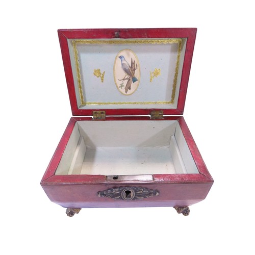 A Regency leather sewing casket shaped box with a sectioned interior ...