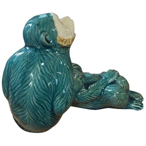 Two Chinese porcelain figures, one of Monkeys, the other a dragon ...