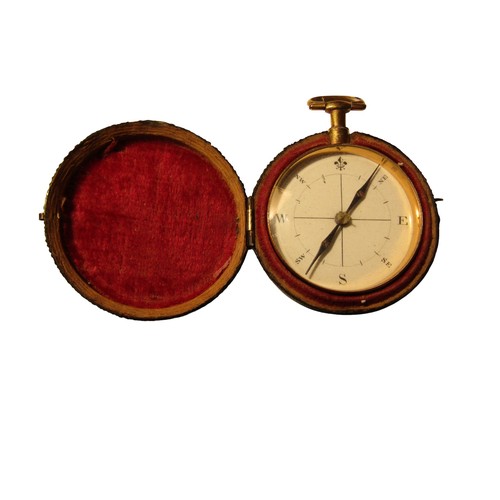 An early 19th century pocket compass with simple enamel dial set within ...