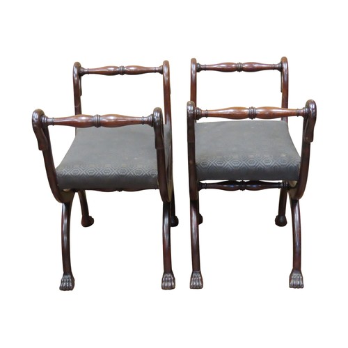 A good matched pair of Regency period mahogany X framed window seats ...