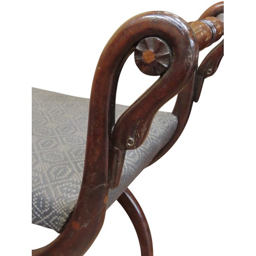 A good matched pair of Regency period mahogany X framed window seats ...