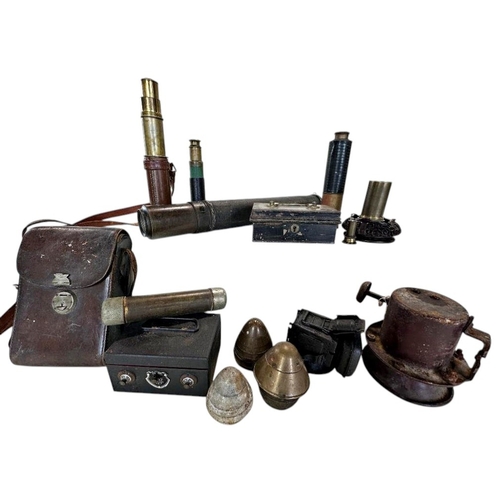 A group of various telescopes and military interest items