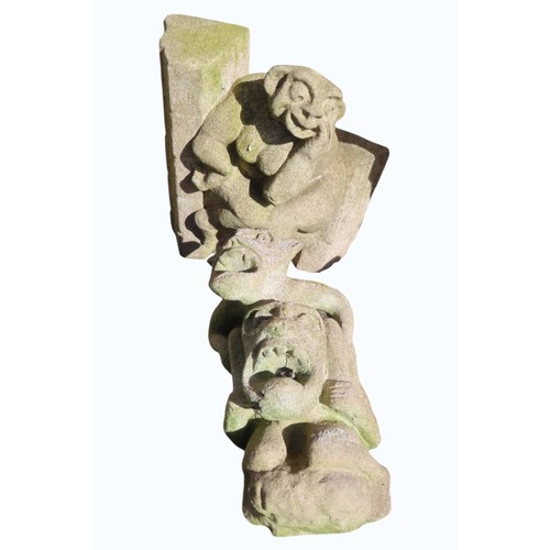 A group of five weathered cast composition stone gargoyle ornaments ...