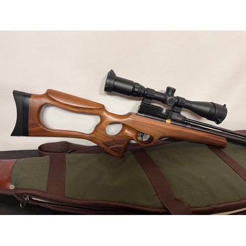Vintage Falcon air rifle with AGS scope and a storage bag. This lot is ...
