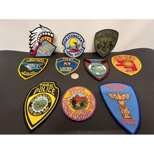 Collection of North American Tribal Police sew on uniform badges, from ...