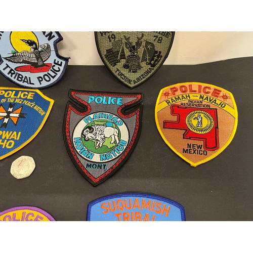 Collection of North American Tribal Police sew on uniform badges, from ...