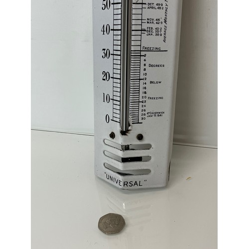 Negretti and Zambria enamelled hanging thermometer. 18 inches long ...