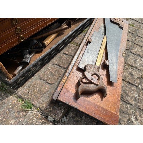 Tools, an unusual drop front tool box with planes chisels and saws ...