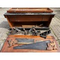Tools, an unusual drop front tool box with planes chisels and saws ...