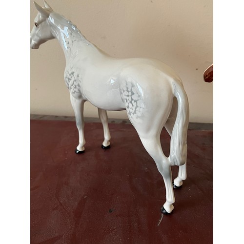 Two Beswick horse figurines. This lot is available for in-house shipping