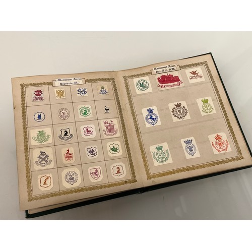 Ephemera, an album of Arms Crests and Stamps, military and family ...