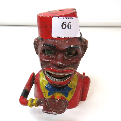 Original vintage Jolly man money bank with Fez hat.