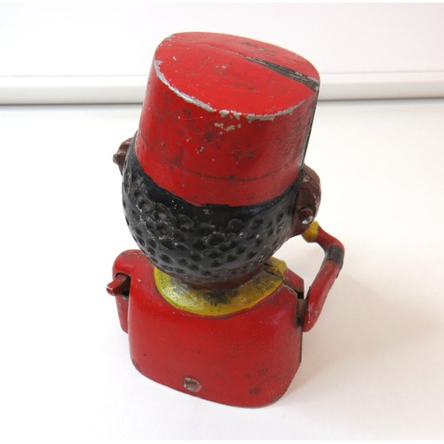 Original vintage Jolly man money bank with Fez hat.