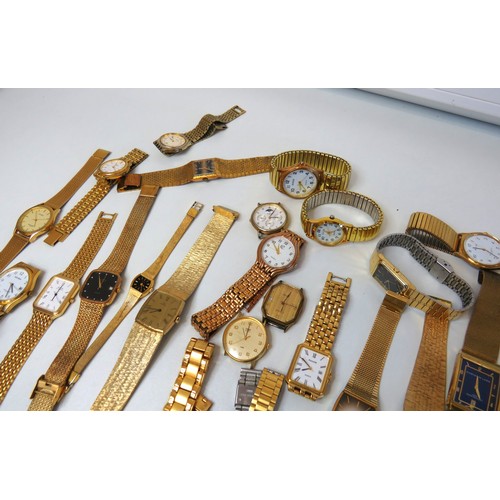 Job lot of assorted gold tone watches.