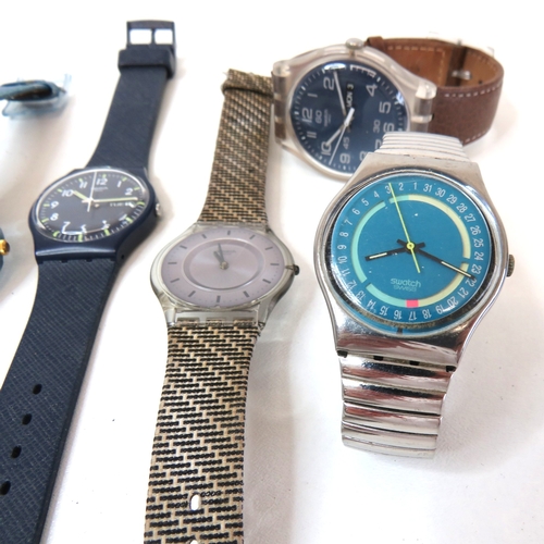 Five vintage Swatch watches.