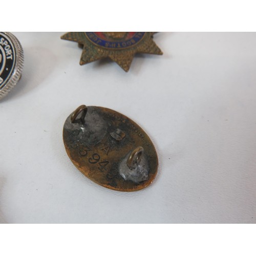 A good collection of vintage and antique pin badges.