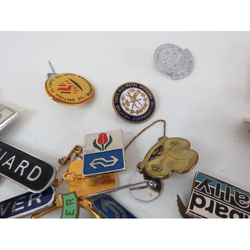 A good collection of vintage and antique pin badges.