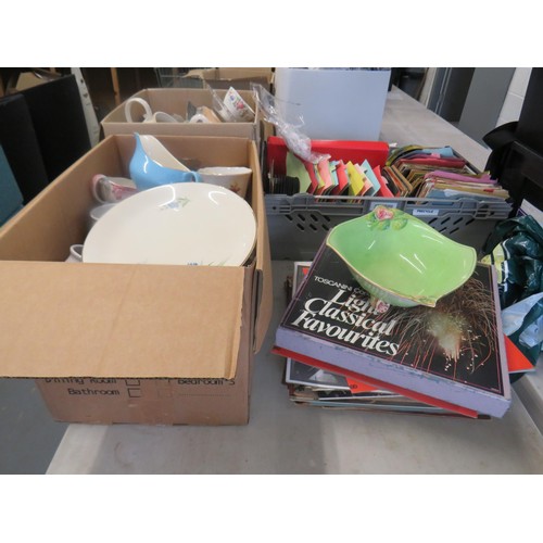 Ten boxes of unsorted items includes records & pictures.