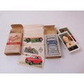 Two cigarette packets full of cigarette cards
