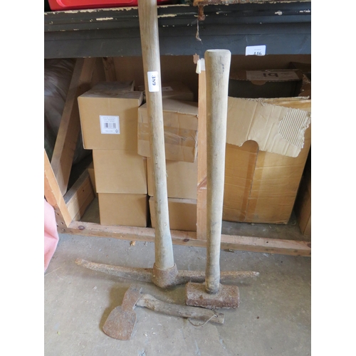 Large pickaxe, large sledge hammer and axe