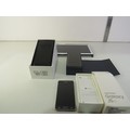 Three boxed smartphones and a samsung tablet including galaxy s7 edge ...