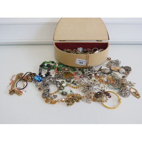 Vintage jewellery box full of jewellery.