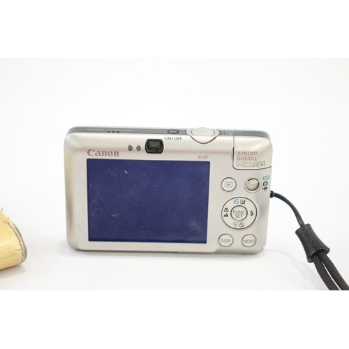 Canon IXUS 100 IS Digital Compact Camera w/ Canon 3x IS Lens