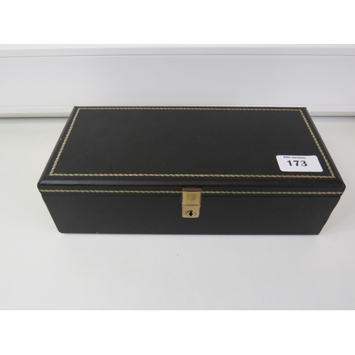 Black jewellery box full of jewellery