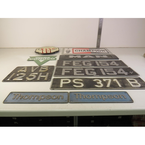 Assortment of signs and reg plates