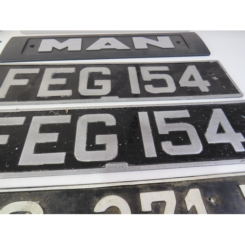 Assortment of signs and reg plates