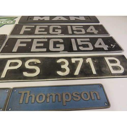 Assortment of signs and reg plates