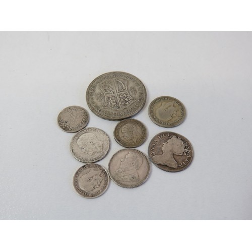 Collection of old silver coins including a queen Anne 1711 6d