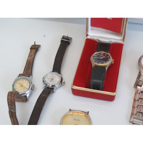 Ten assorted watches and a watch head to include digital, timex ...