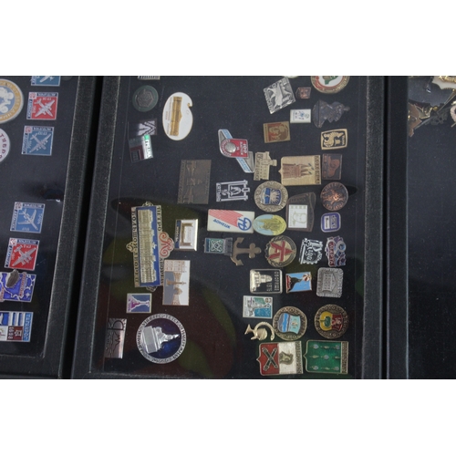 Job lot of assorted pin badges and display cases.