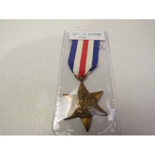 WWII 1939 field dressing, badge, and medal awarded to Sergeant Wardale ...
