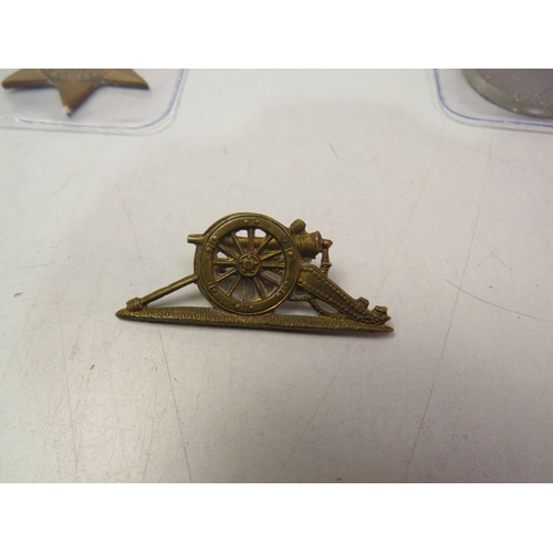 WWII 1939 field dressing, badge, and medal awarded to Sergeant Wardale ...