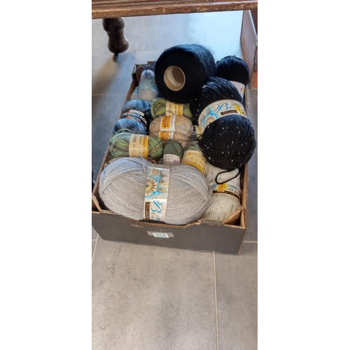 Box of wool in different colours