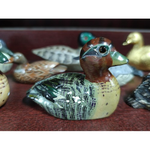 A collection of 22 wooden, ceramic and stone ducks, many are hand ...