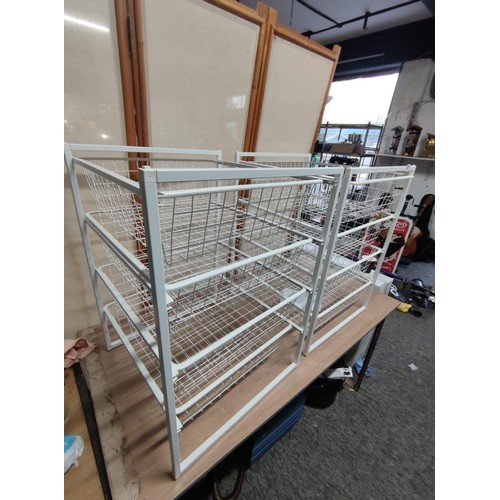2x white metal storage racks, each rack has 4 basket shelves in good ...