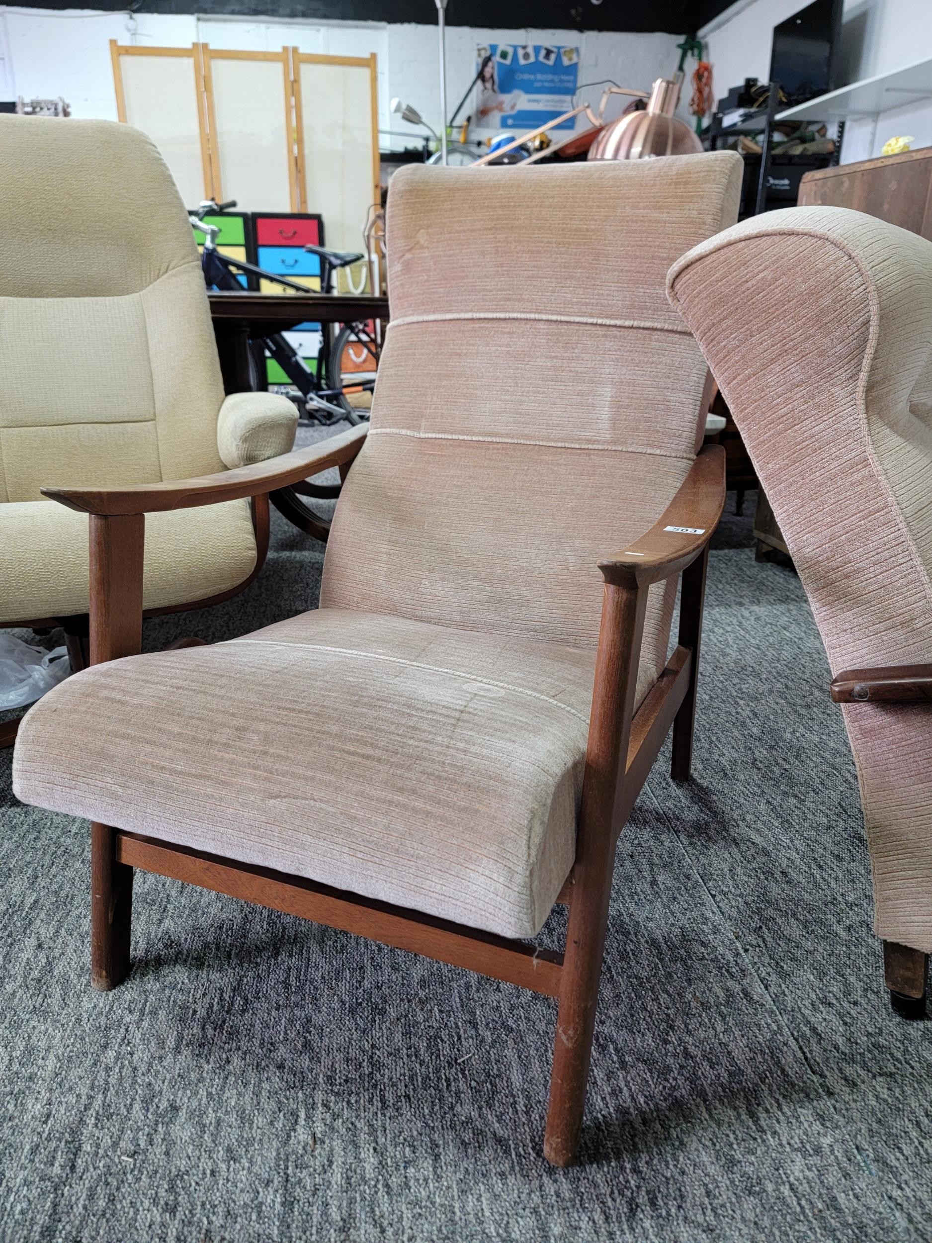 2 x vintage arm chairs one low slung and both upholstered in dusky pink ...