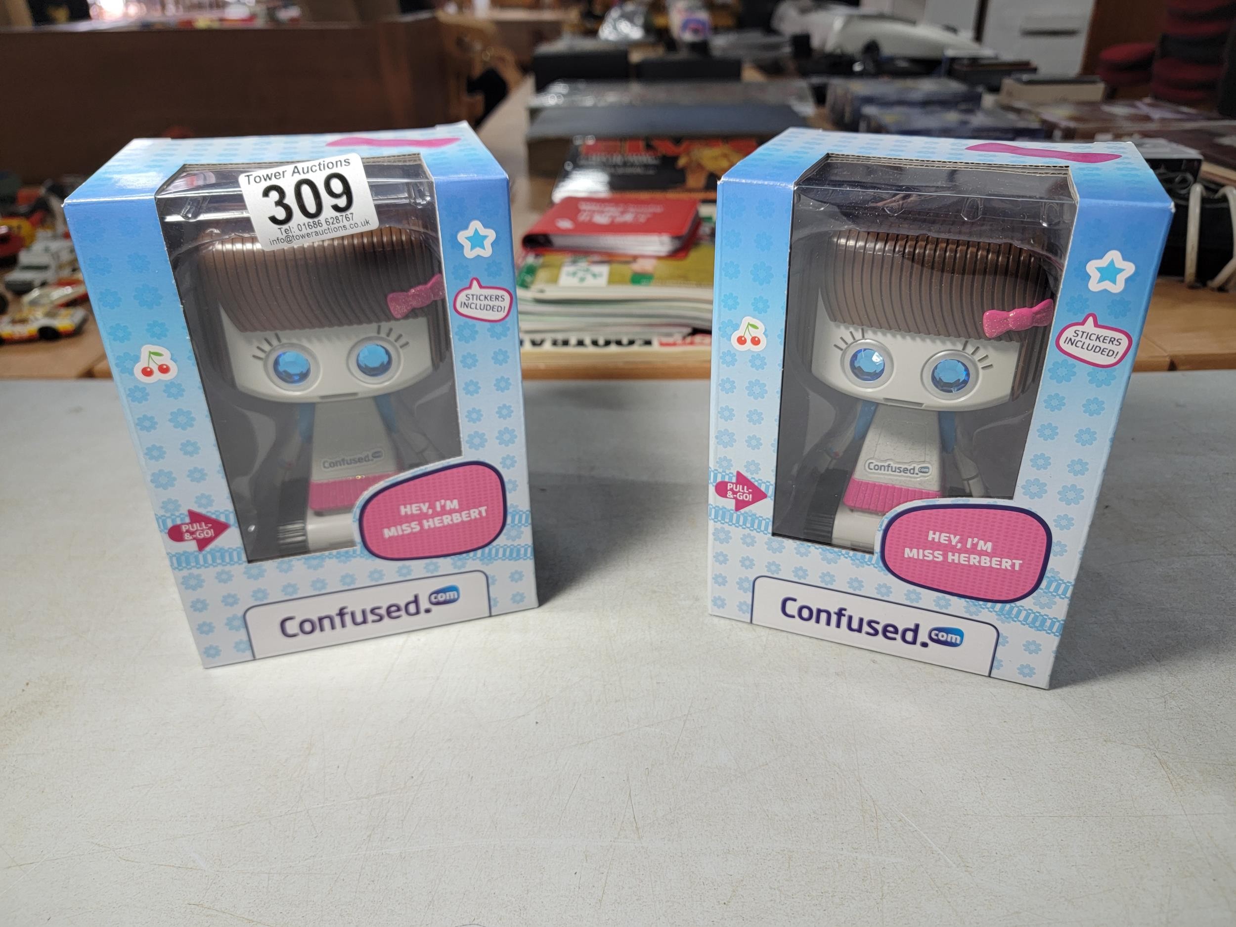 2x as new Miss Herbert Confused.com robots, complete in original boxes