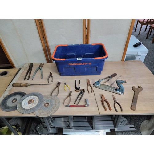 Crate containing a quantity of grinding disks, pliers, spanners, metal ...