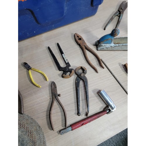 Crate containing a quantity of grinding disks, pliers, spanners, metal ...