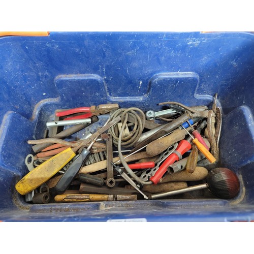 Crate containing a quantity of grinding disks, pliers, spanners, metal ...